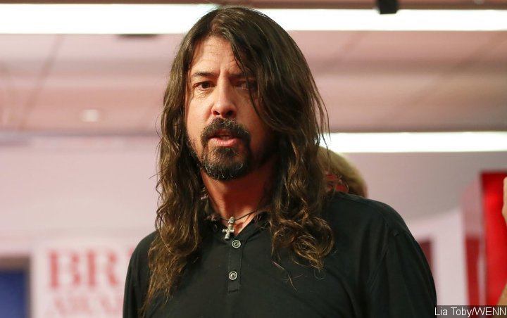 Dave Grohl Confesses His Arm Surgery Forced Foo Fighters to Cancel New ...