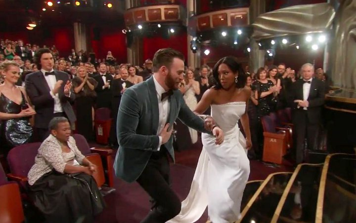 Oscars 2019: People Swoon at Chris Evans After He Escorts Regina King ...