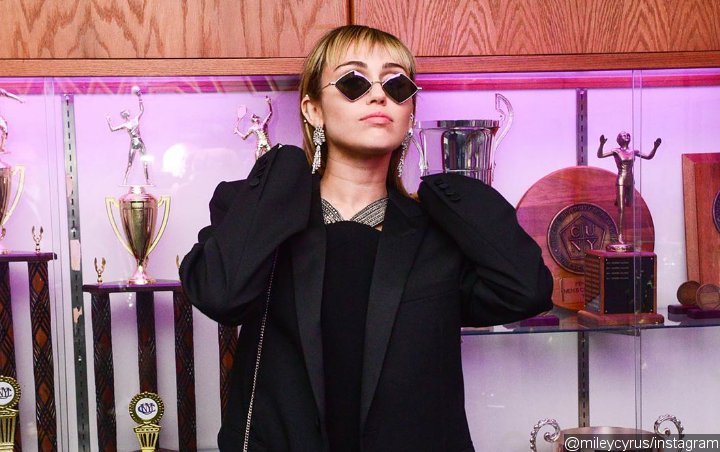 Miley Cyrus Strips Down to Lacy Underwear Due to Missing Luggage