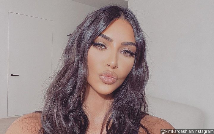 Watch Kim Kardashian Get Her Hair Cut With Craft Scissors in Parking Lot