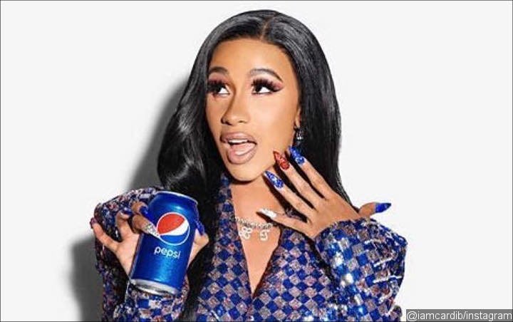 Watch: Cardi B Gives Christmas Carol Her Own Fun Twist in New Pepsi ...