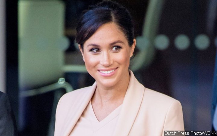 Meghan Markle All Smiles in First Pics Since Royal Exit as She Skips ...