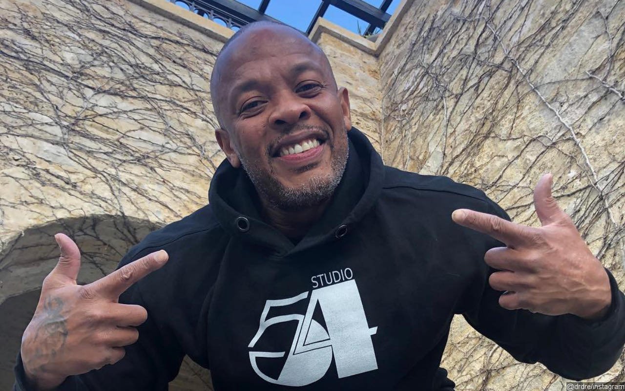 Dr. Dre Steps Out With Sexy Mystery Woman Amid Divorce Battle