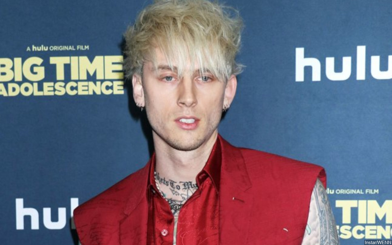 Machine Gun Kelly Bids Farewell to His Neck While Debuting Gory New Tattoo
