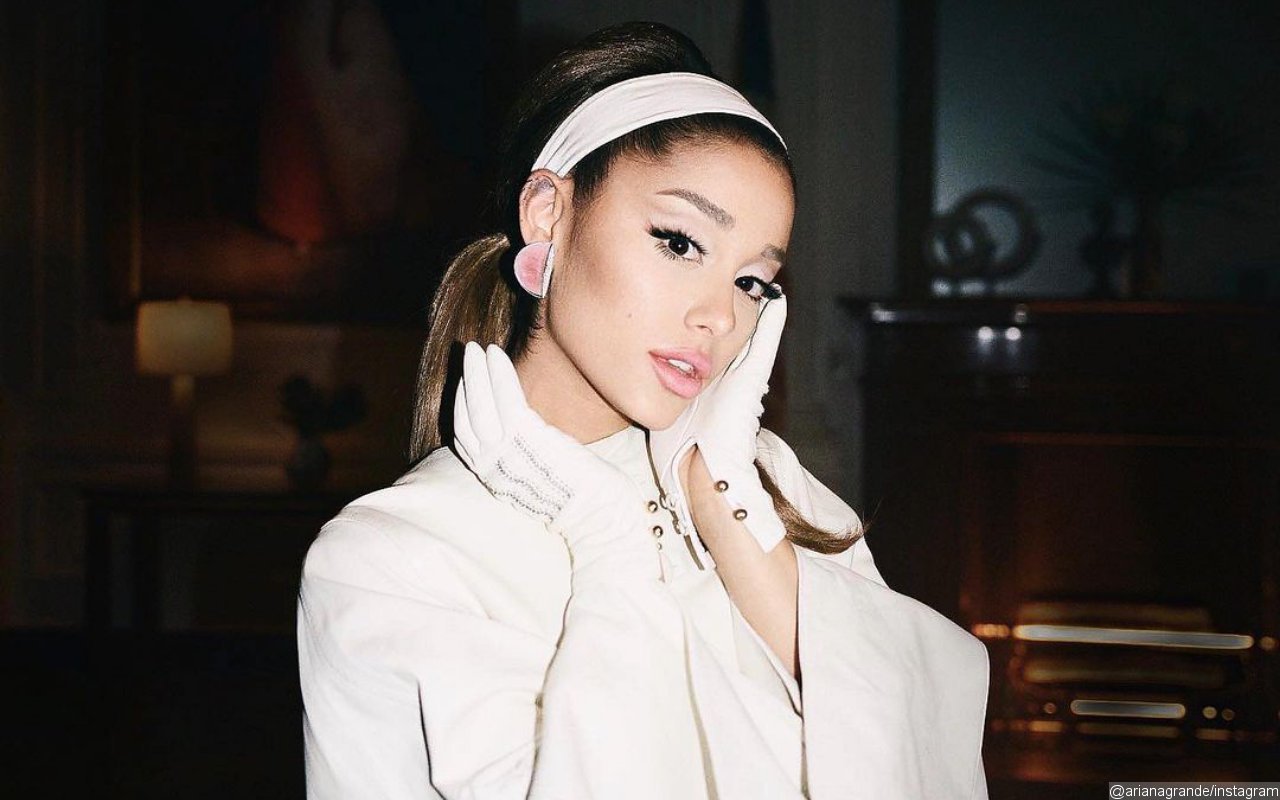 Ariana Grande's Wax Figure Rocks Black Lace Two-Piece Set at Madame ...