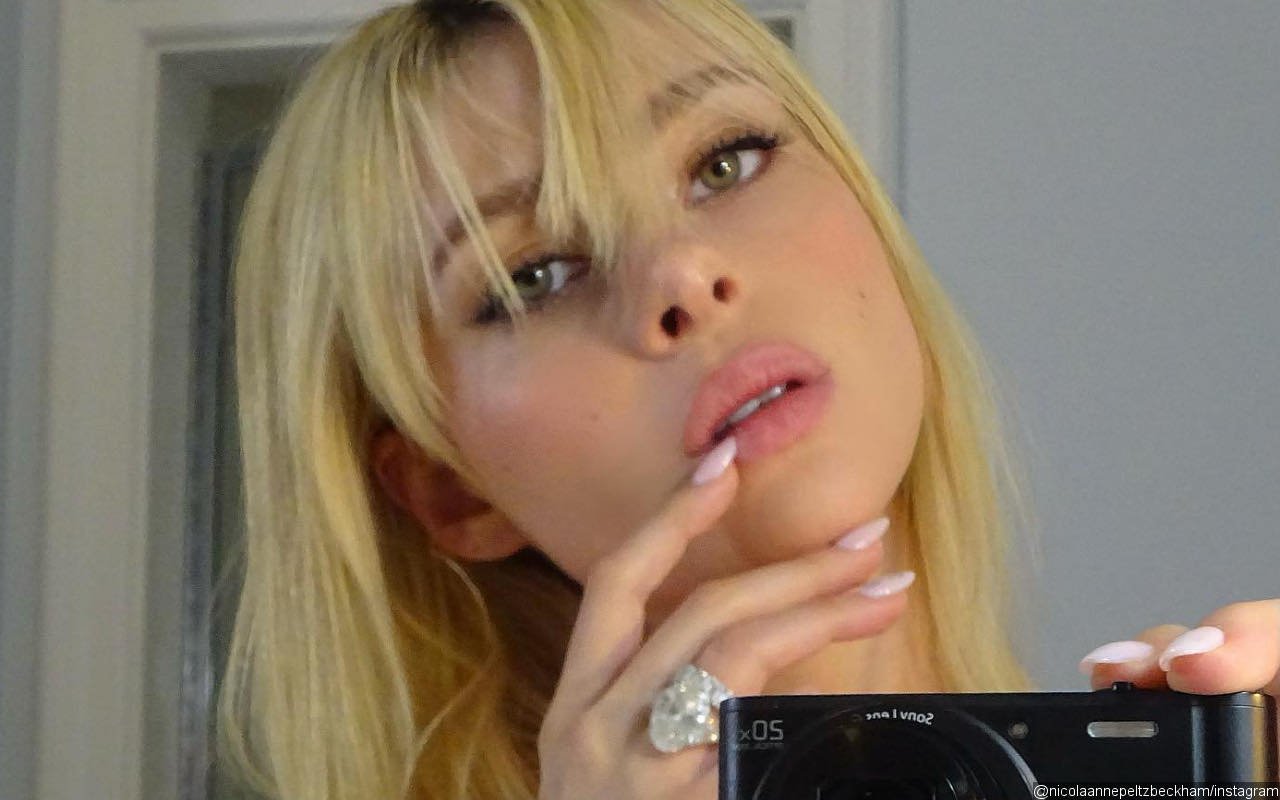 Nicola Peltz Shows Off Diamond Wedding Ring In New Selfies