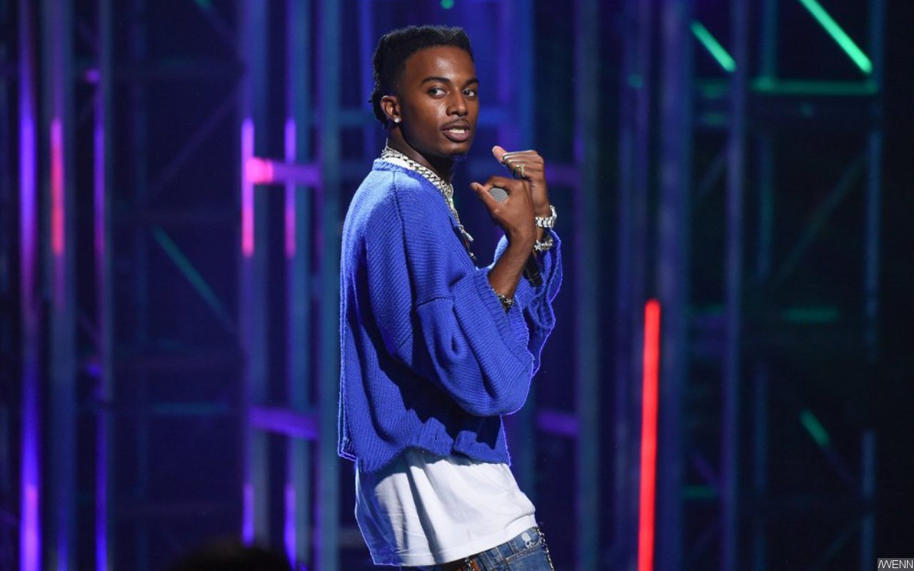 Is Playboi Carti Kissing a Male Fan Onstage?