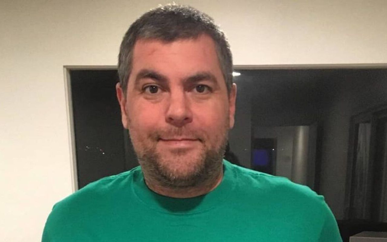 Dryden Mitchell Charged With Misdemeanour Battery for Forcing Male Fan ...