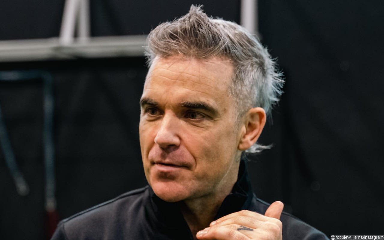 Robbie Williams Says 'It's Great to Be a Cat' as He's Tapped as New ...