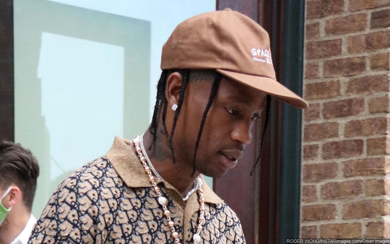 Travis Scott Gives His Shoes and Shirt to a Fan Rapping His Lyrics at ...