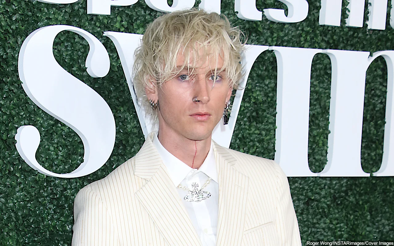 Machine Gun Kelly Sheds Red Tear and Flaunts Metal Teeth in New ...