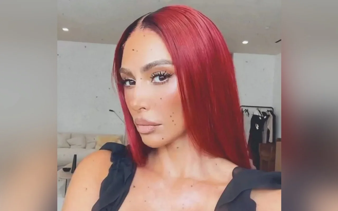 Kim Kardashian Embraces Upcoming Fall Season With Fiery Red Hair