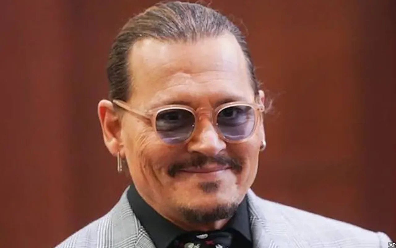 Johnny Depp Shows Off New Smile After Viral 'Rotting' Teeth Photos