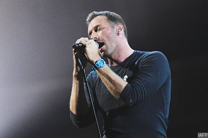 Wham! and Chris Martin Pay Tribute to George Michael at BRIT Awards