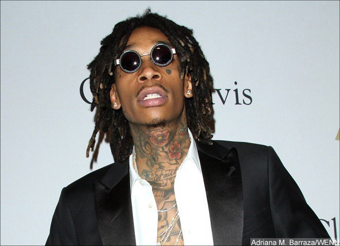 Wiz Khalifa Holds Hands With Mystery Woman