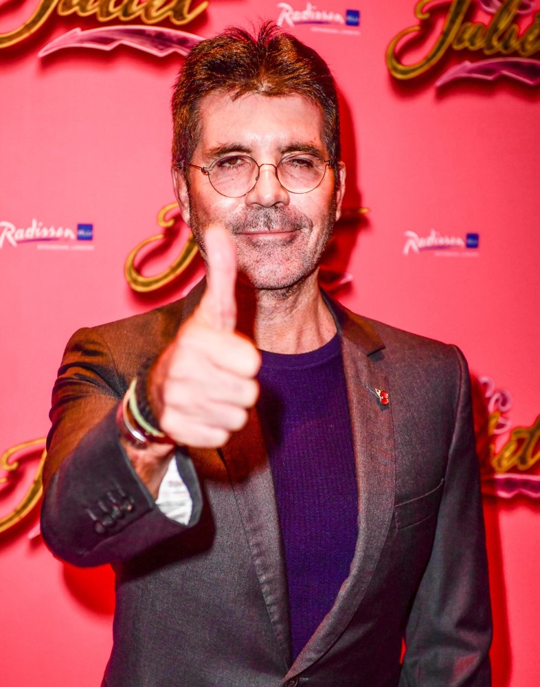 Simon Cowell Pictures, Latest News, Videos.