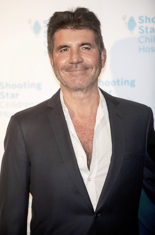 Simon Cowell Pictures, Latest News, Videos.